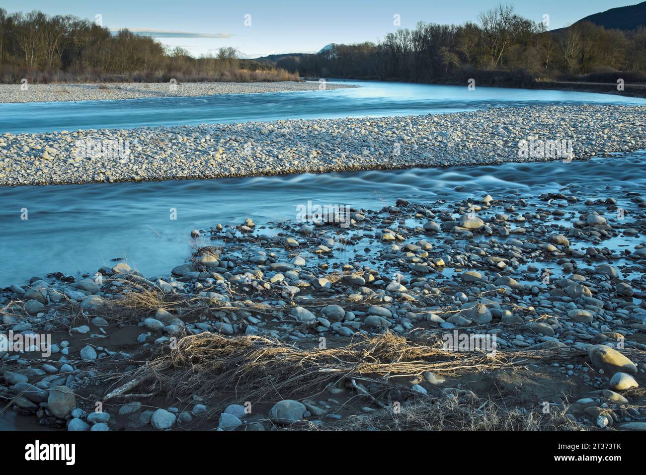 River bank with boulders Stock Photo - Alamy