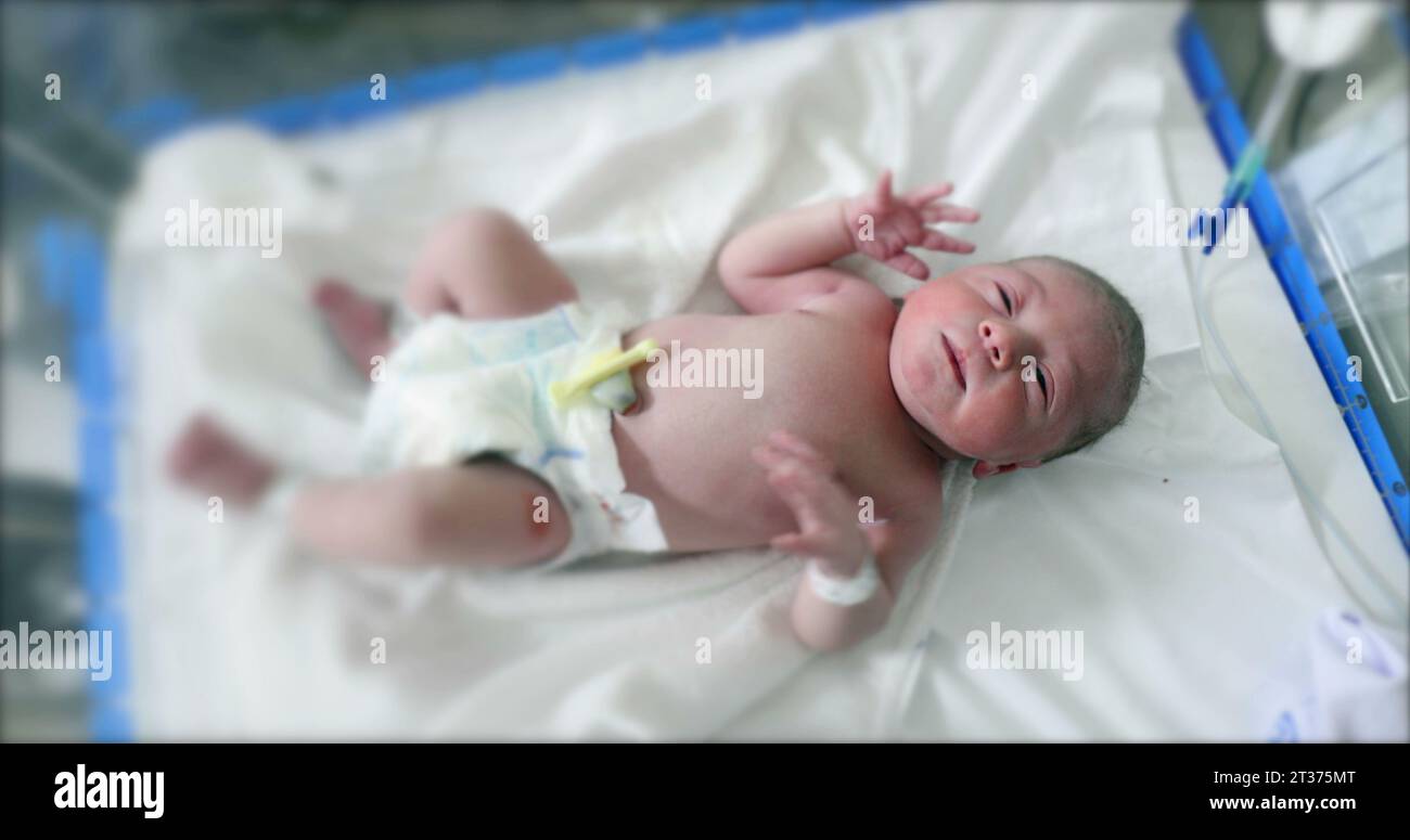 Newborn baby crying first minutes of life Stock Photo - Alamy