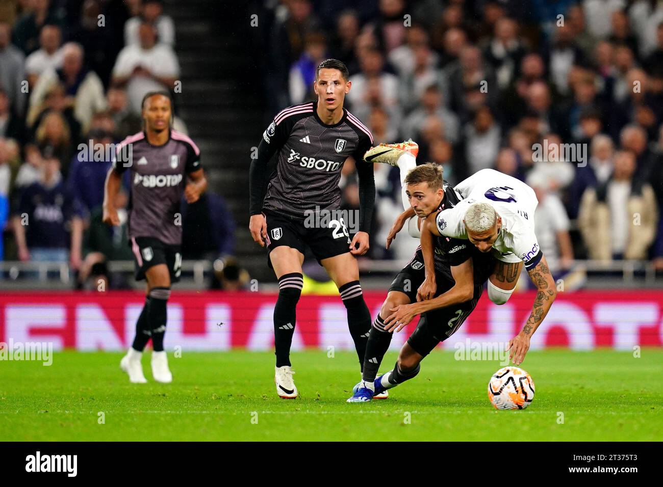 Fulham's Timothy Castagne collides with Tottenham Hotspur's Richarlison ...