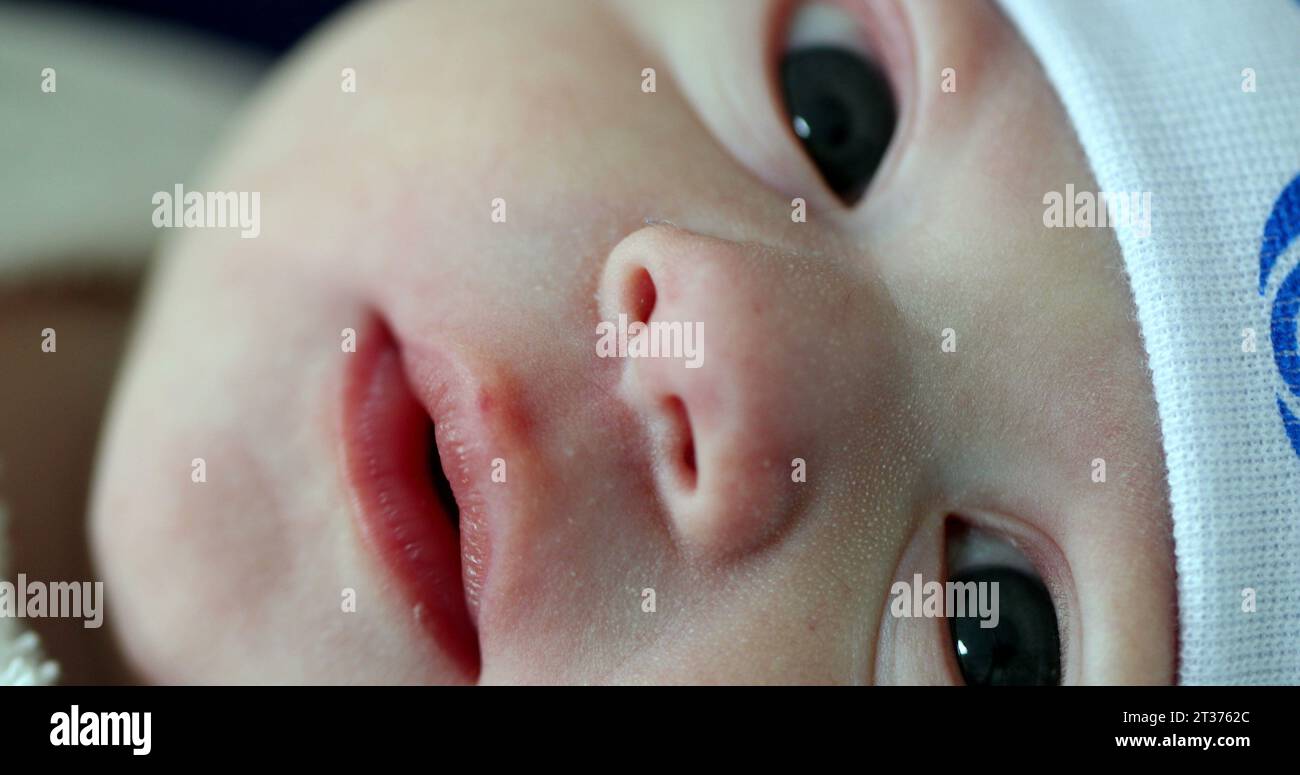 Newborn baby face close-up details of eyes nose and mouth in first ...