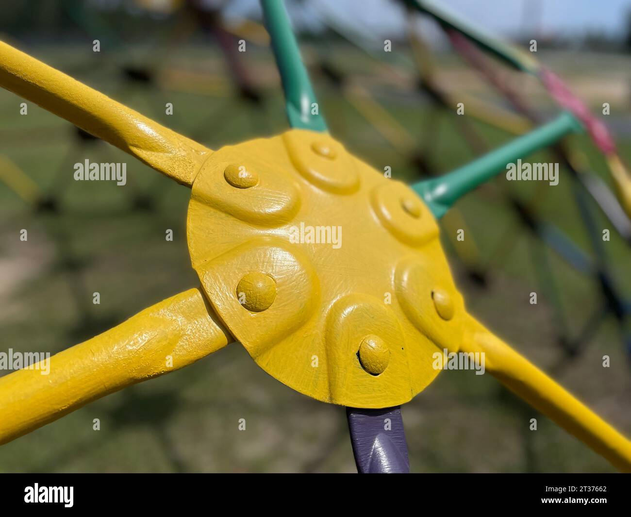 Kiddie park yellow plate and green bars Monkey bars background texture ...
