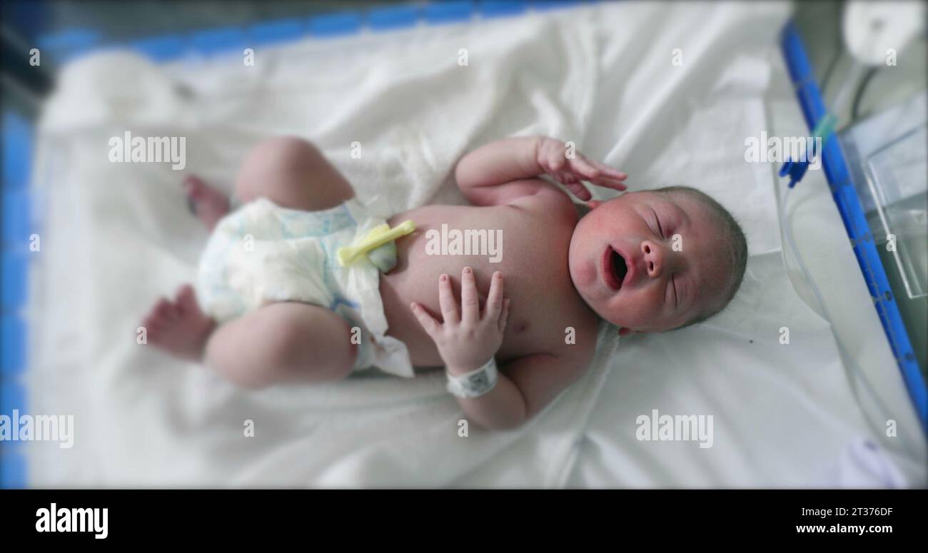 Newborn baby cries Stock Photo - Alamy