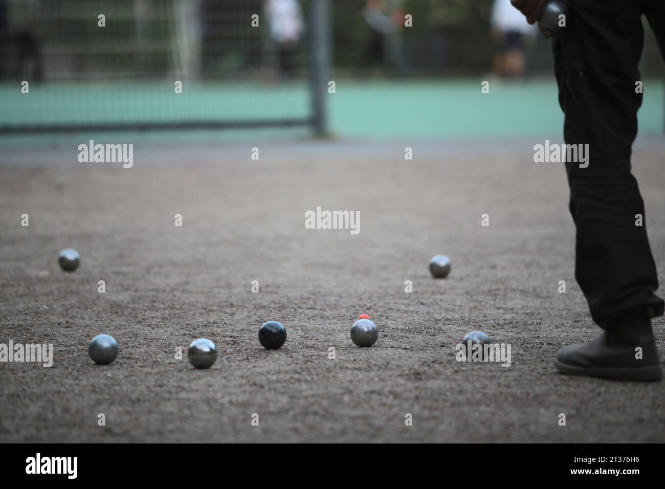 detail image of people playing boules in a park Stock Photo - Alamy
