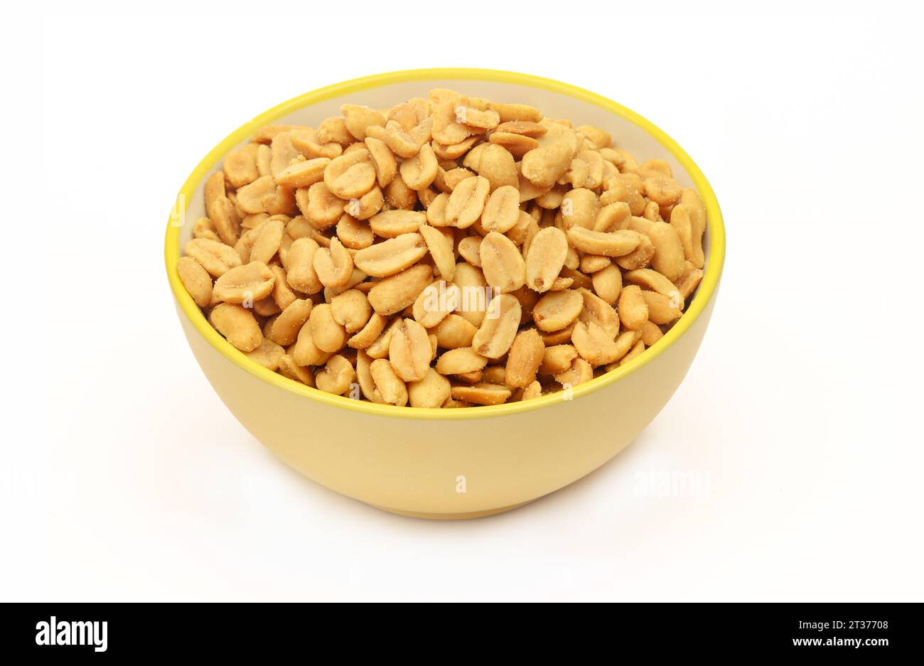 Yellow bowl full of roasted salty peanuts isolated on white background ...