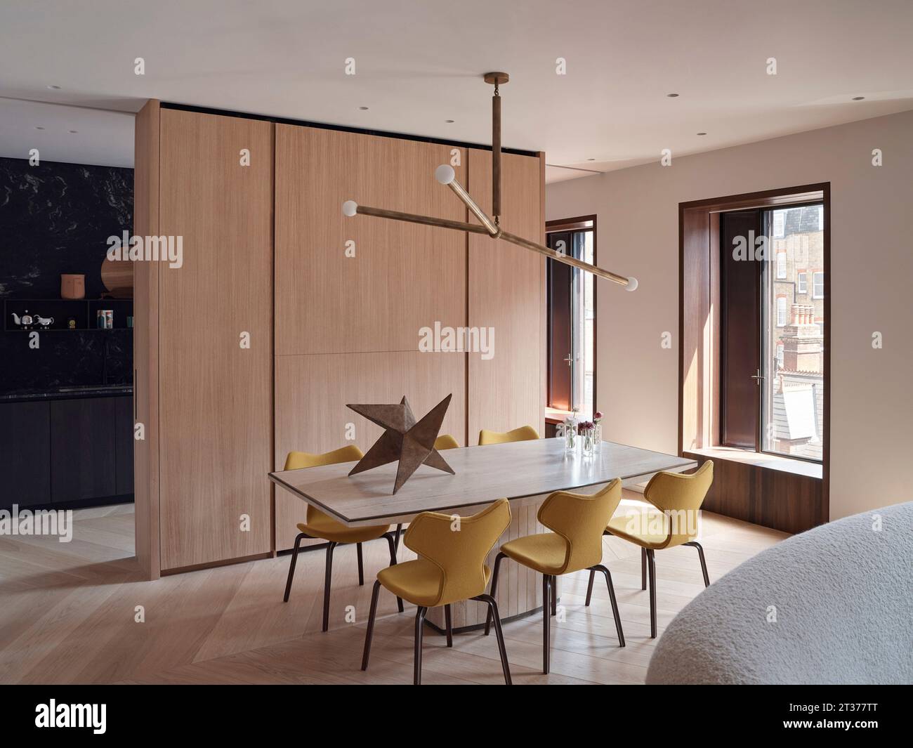 Dining area with partitioned kitchen. Mount Row Apartments, London ...