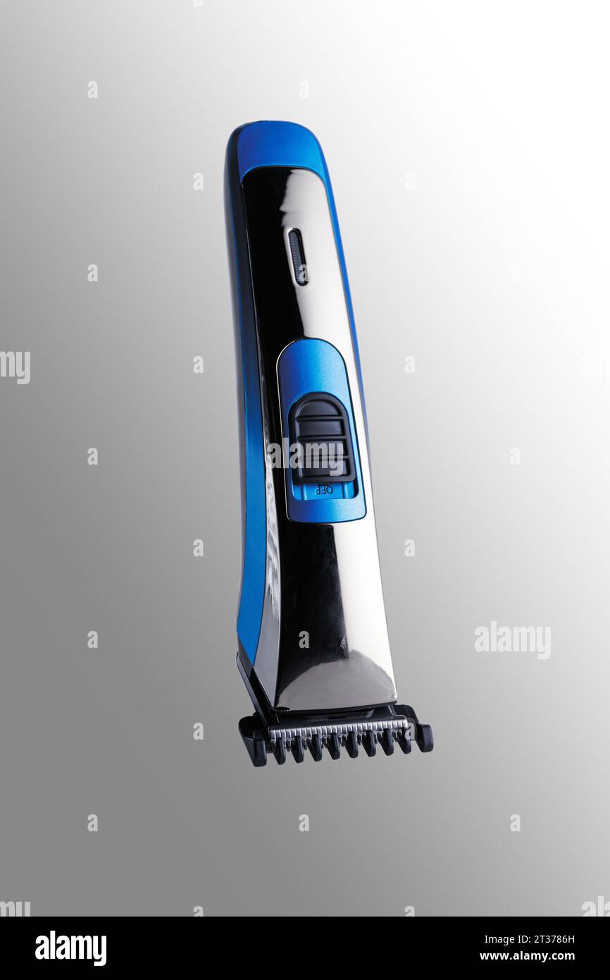 Beard and mustache trimmer. Close-up. Isolated on a gray background ...