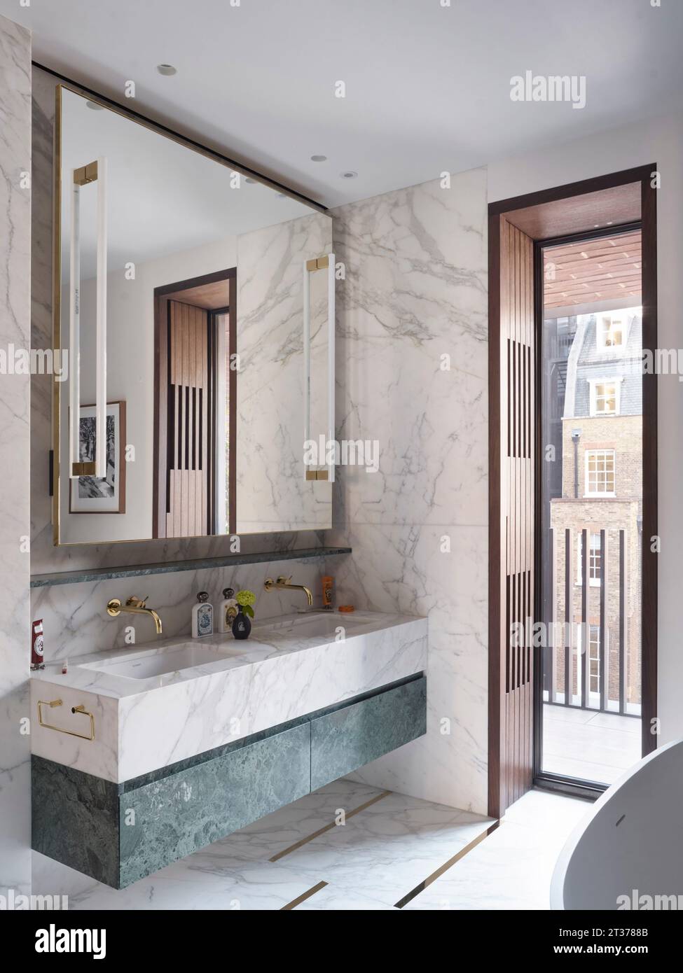 Bath with window to balcony. Mount Row Apartments, London, United ...