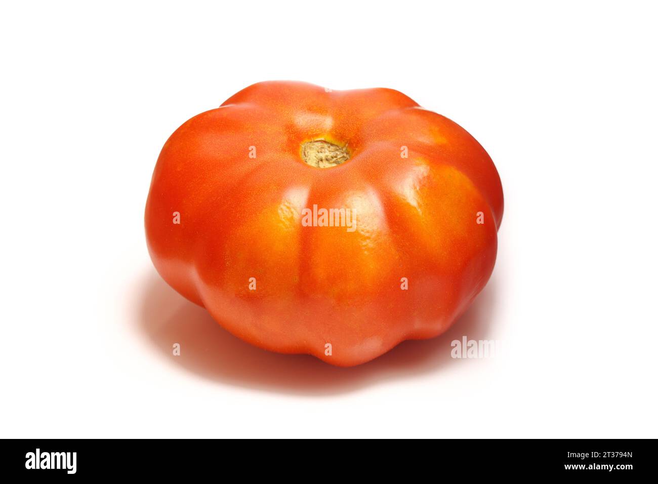 Single homegrown tomato isolated on white background Stock Photo - Alamy