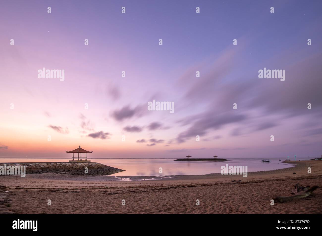 Sunrise over the sea. View from the sandy beach to the horizon. There ...