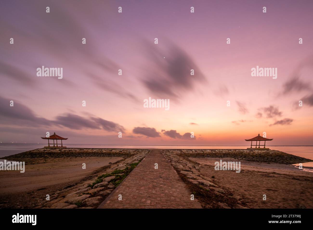 Sunrise over the sea. View from the sandy beach to the horizon. There ...