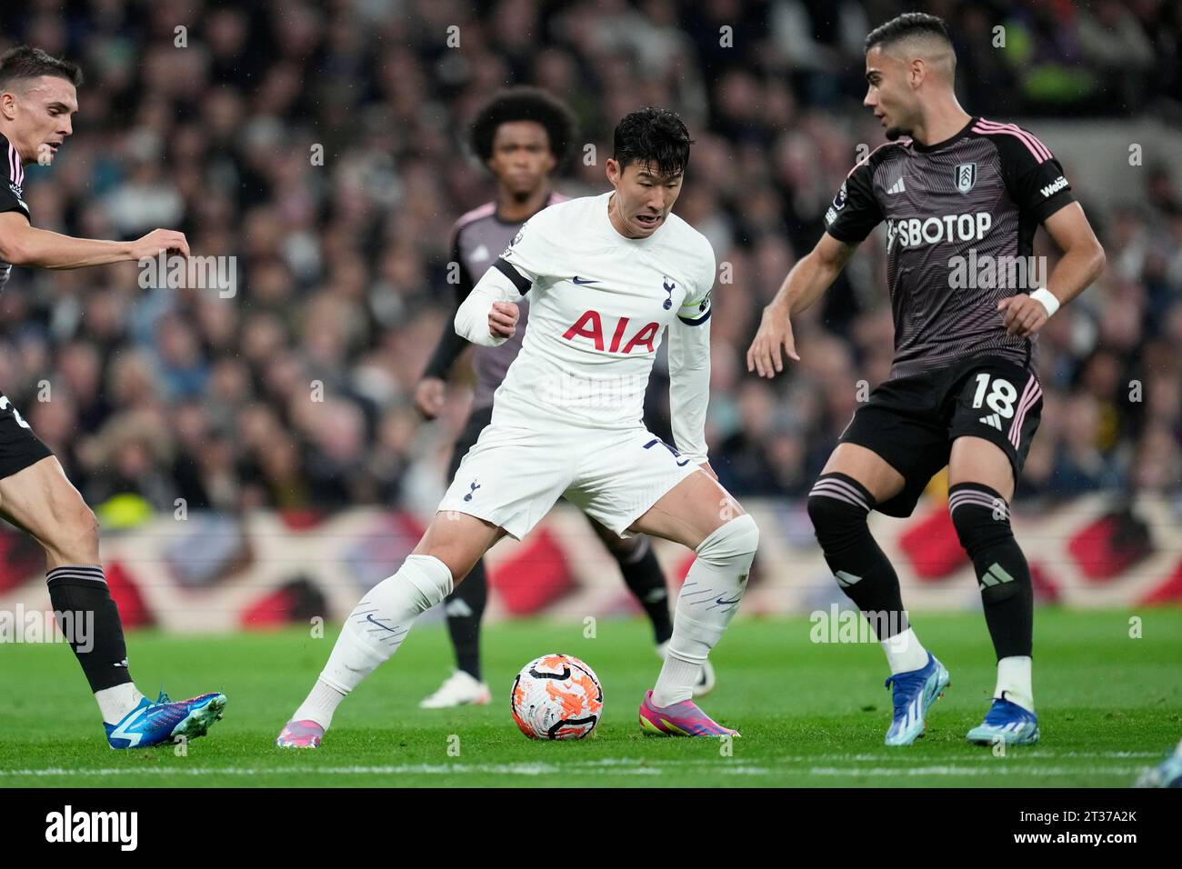 Tottenham's Son Heung-min, centre, in action during the English Premier ...
