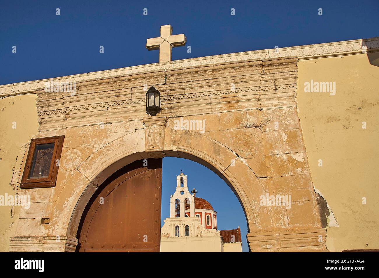 Entrance gate, stone cross, half open, church, bell tower, dome, Agios ...