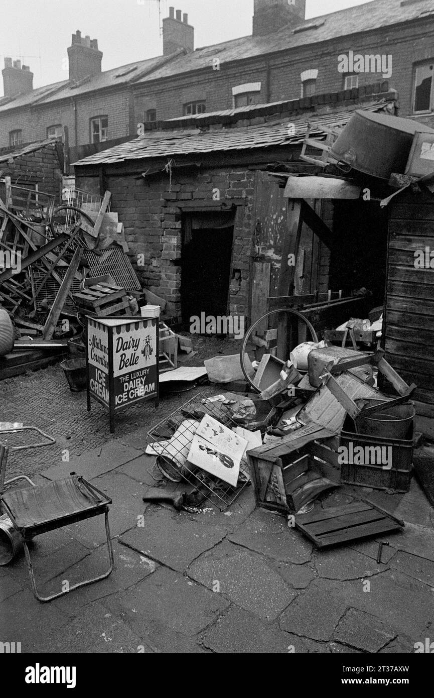 Discarded items outside a storage unit at the rear of a shop, photo ...