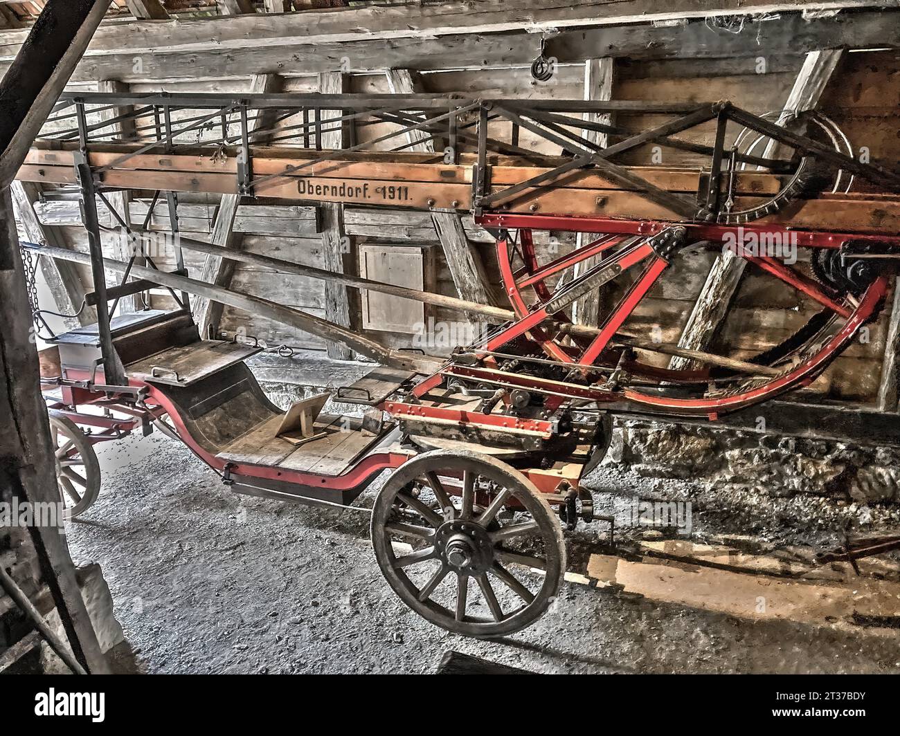 Old style slightly alienated photo of Historic fire engine for horse ...