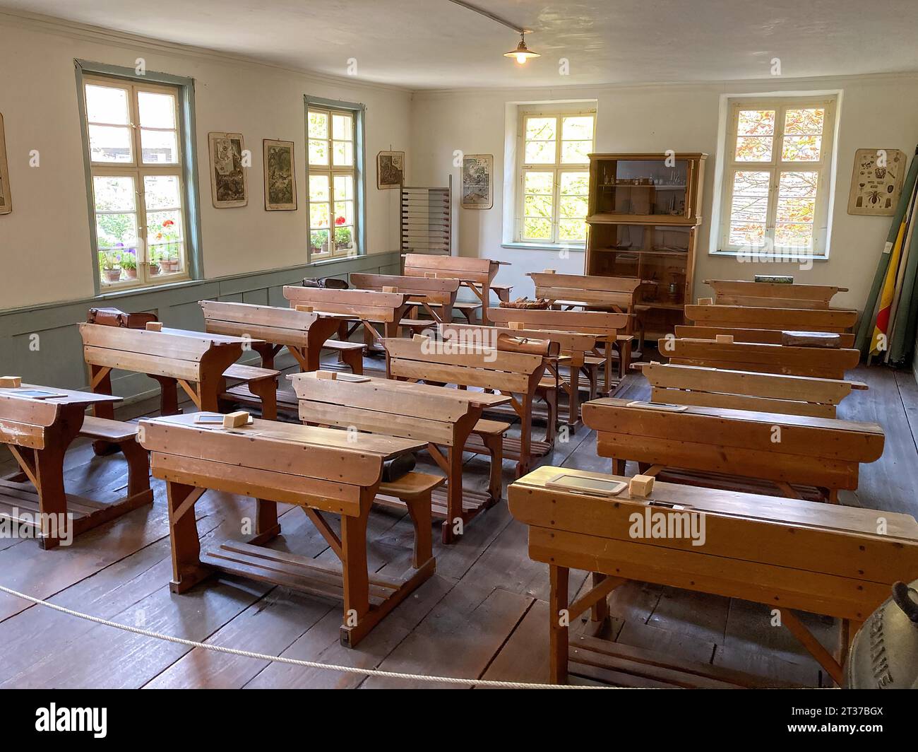 Historic classroom with old-fashioned school desks for school class in ...