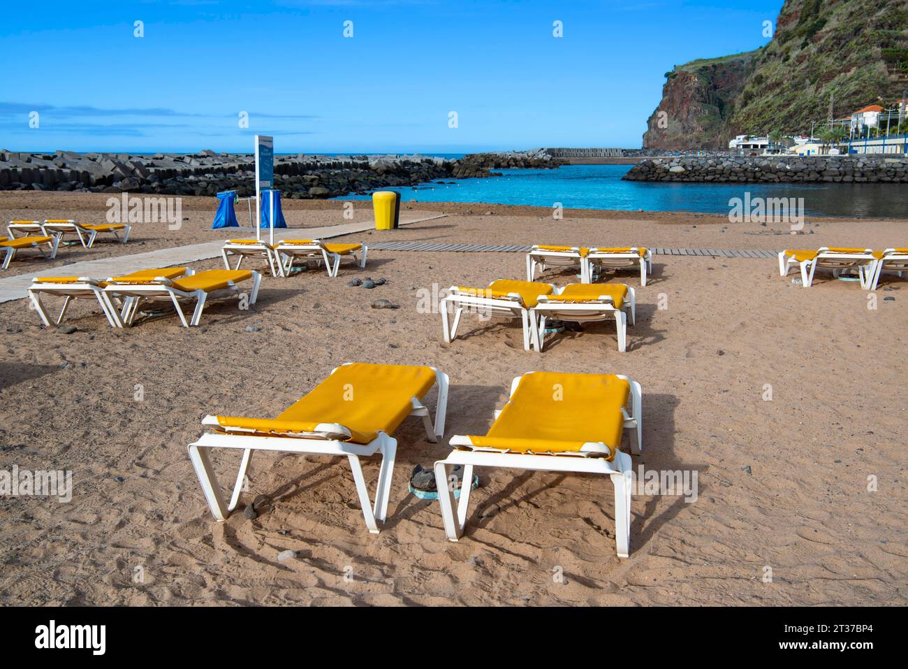 Artificially heaped up desolate sandy beach of Calheta, Madeira Island ...