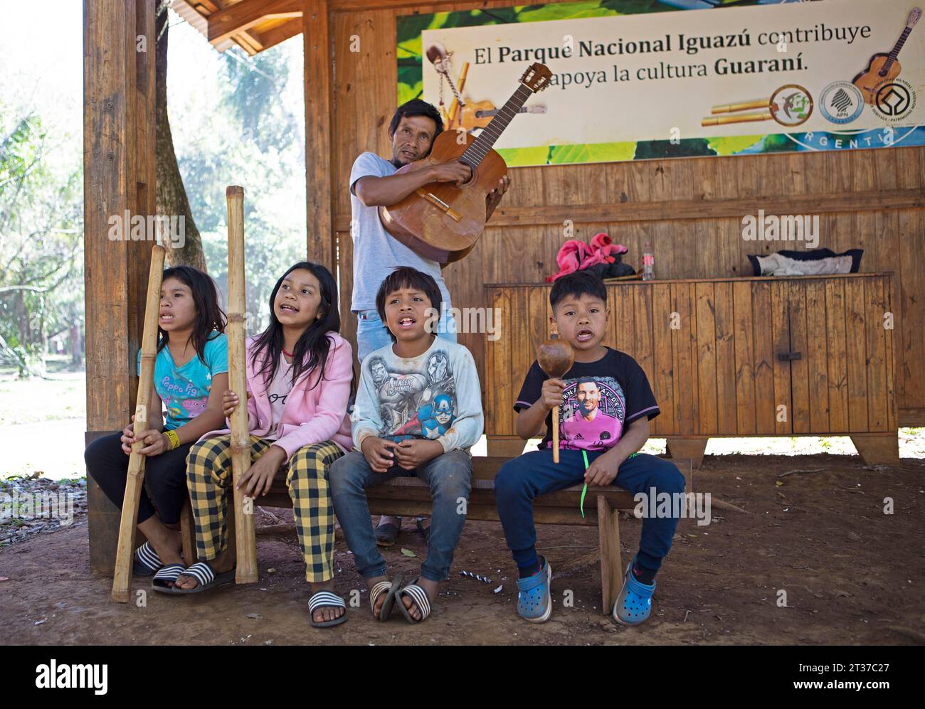 Guarani children playing music in Iguazu National Park, Misiones ...