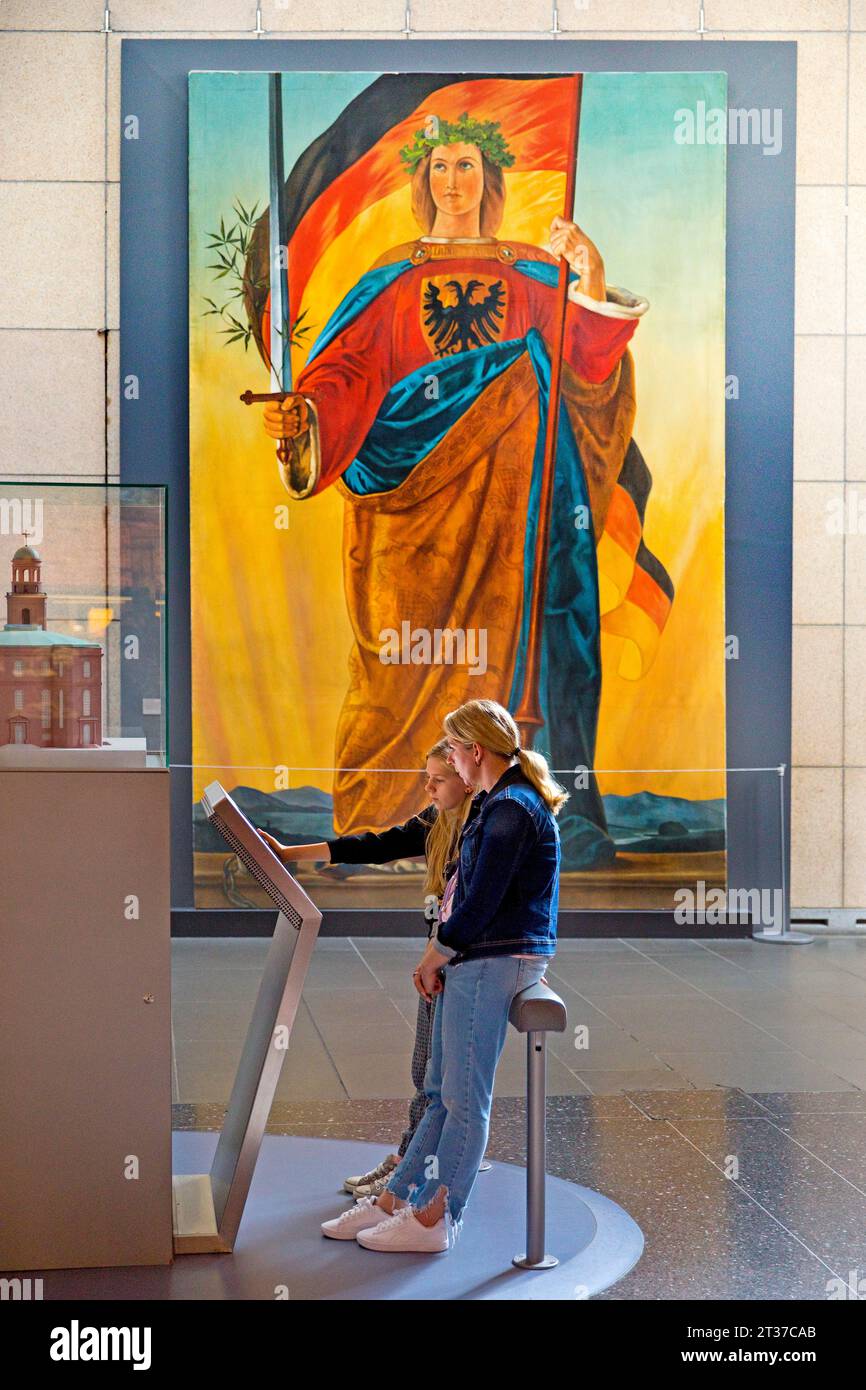 Two woman at a screen in front of the painting of Germania by Philipp ...