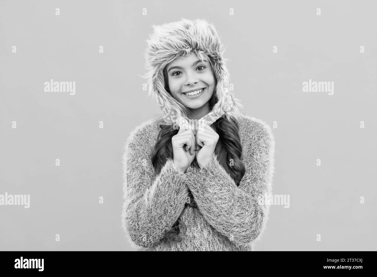 female fashion model. teen girl in knitwear on yellow background ...