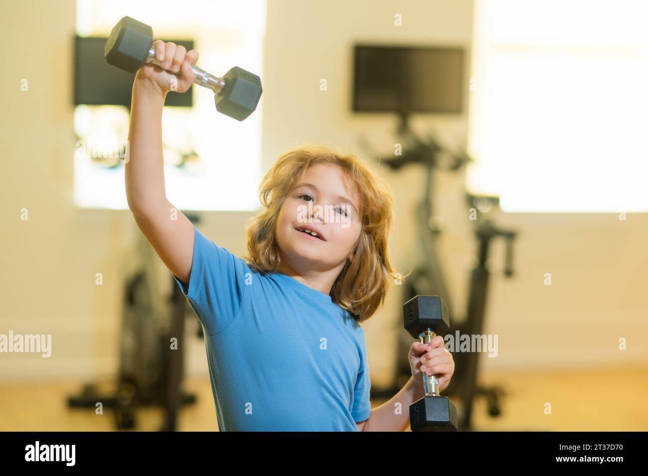 Sport activities at leisure with children. Child workout kid in gym ...