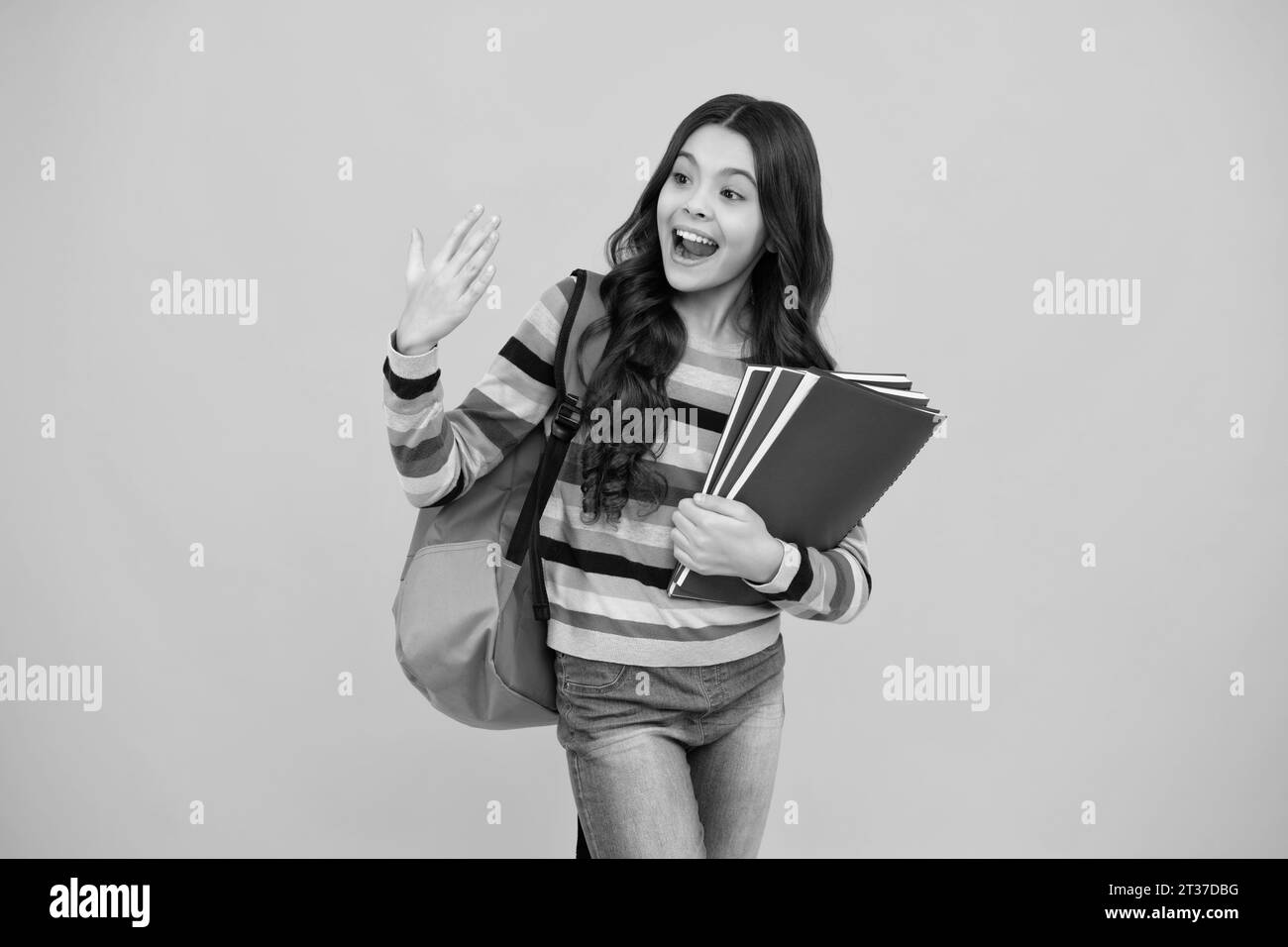 Happy school teenage girl with book and copybook. Teenager schoolgirl ...