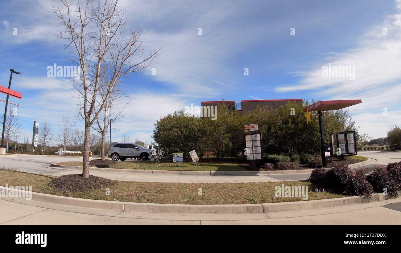 Augusta, Ga USA - 01 19 22: Hardees fast food restaurant exterior drive ...