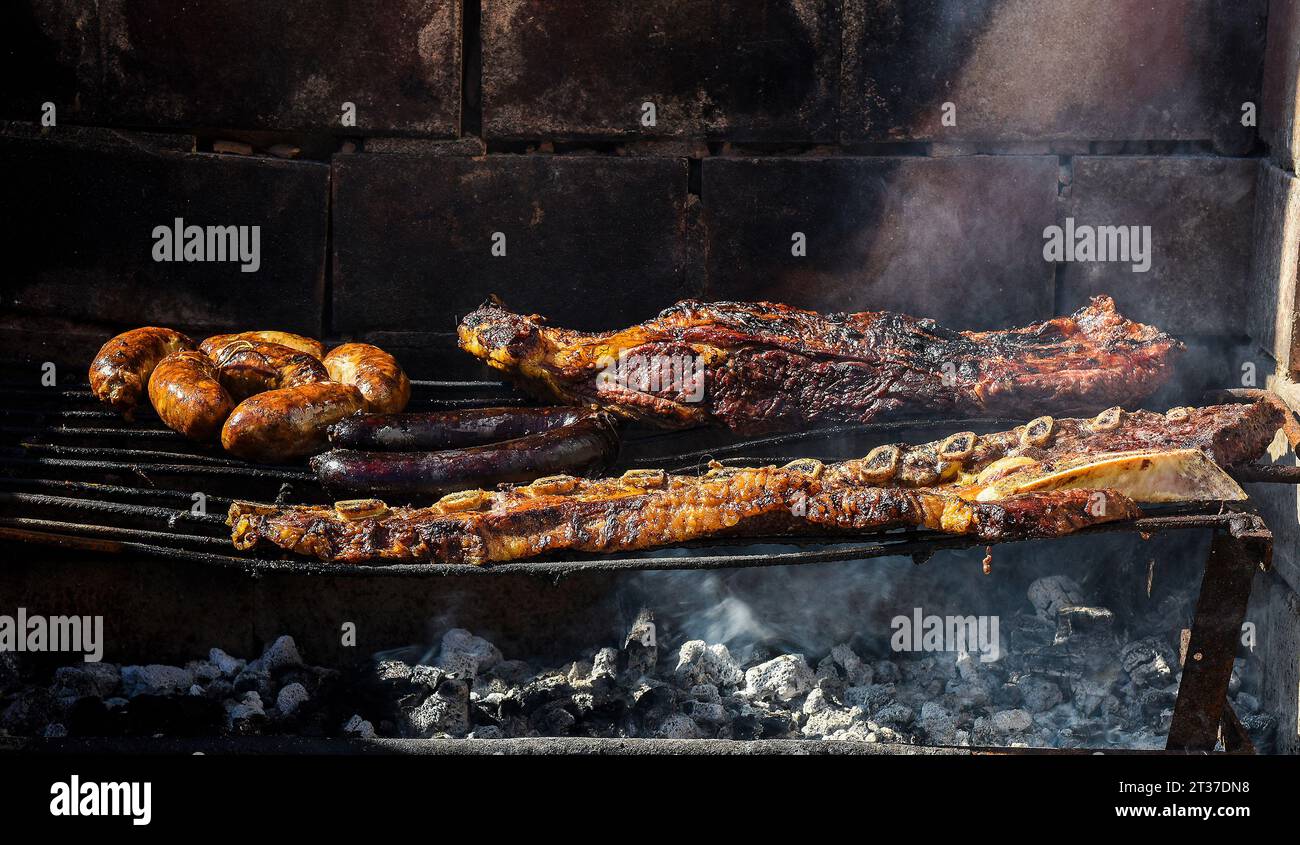 Barbecue, grilled sausages and cow meat , traditional argentine cuisine ...