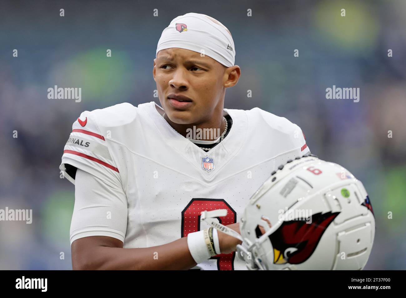 Arizona Cardinals quarterback Joshua Dobbs on the field with his helmet ...