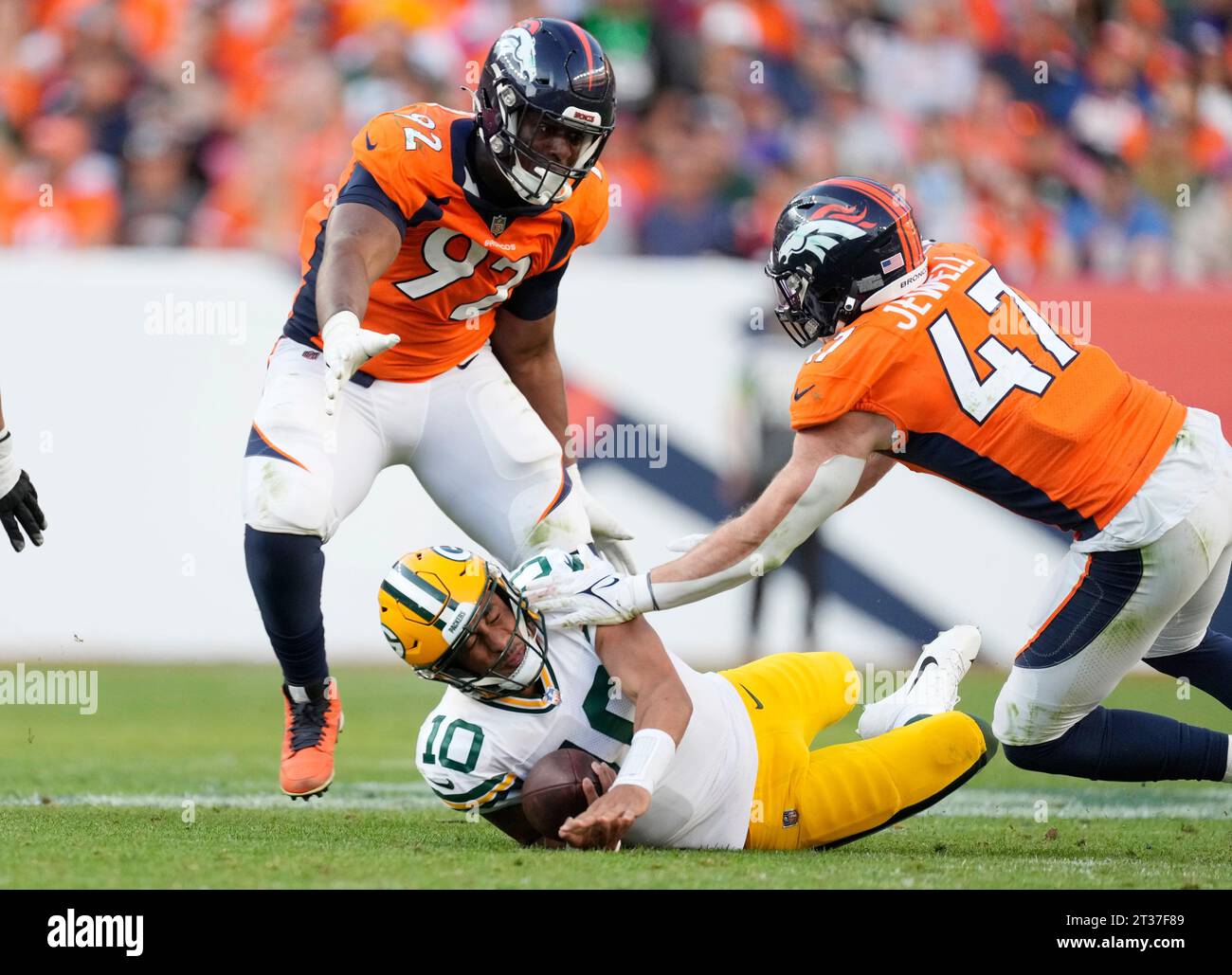 Green Bay Packers quarterback Jordan Love (10) is stopped after a shot ...