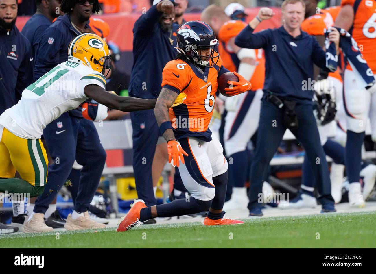 Green Bay Packers wide receiver Jayden Reed (11) tackles Denver Broncos ...