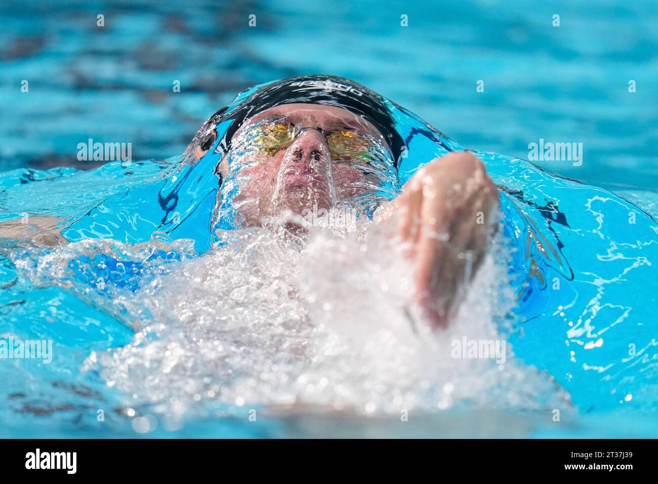 Adam Chaney of the United States swims to win the gold medal in the men ...