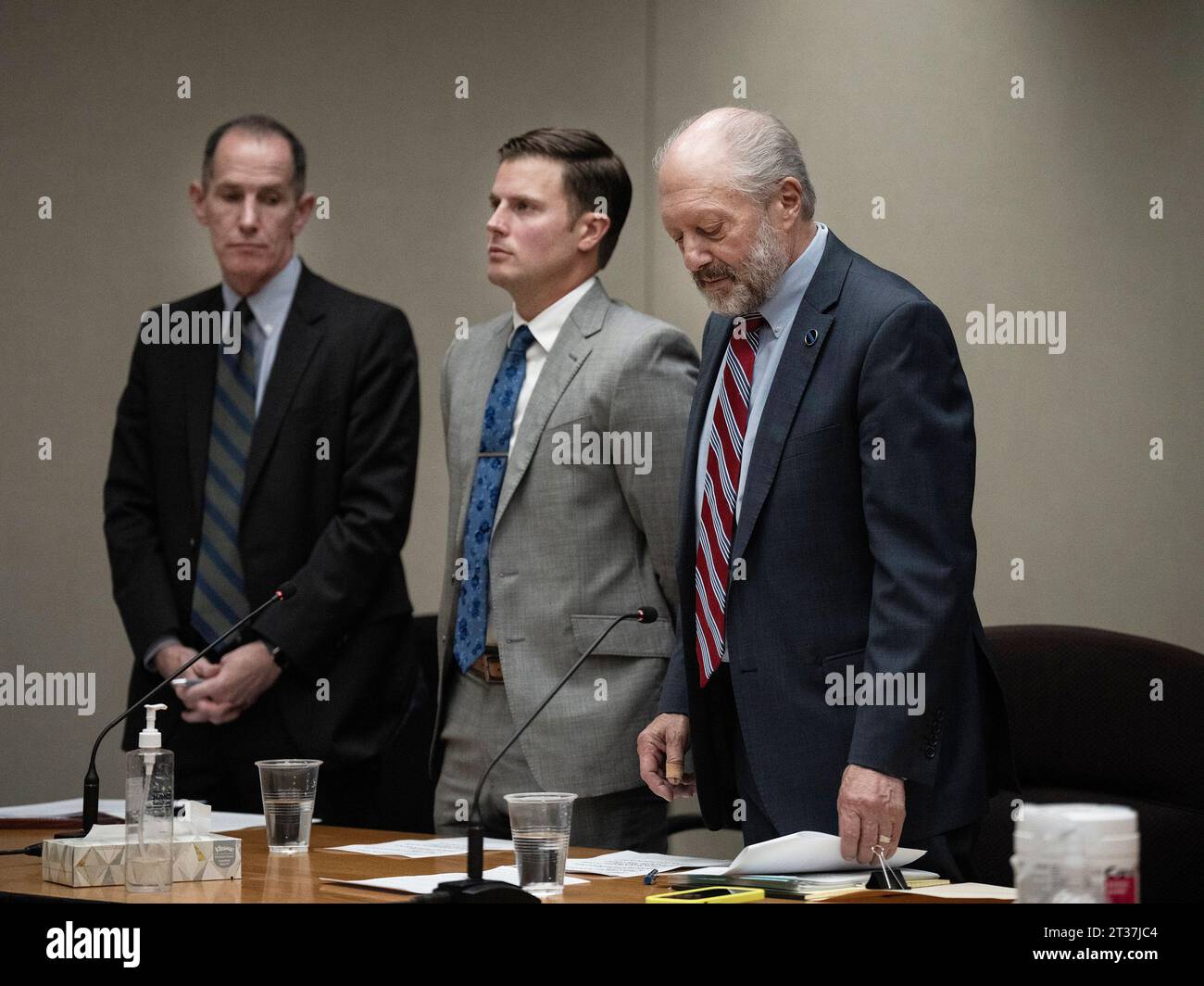 Attorneys Chris Madel, left, and Fred Bruno, right, stand by the side ...
