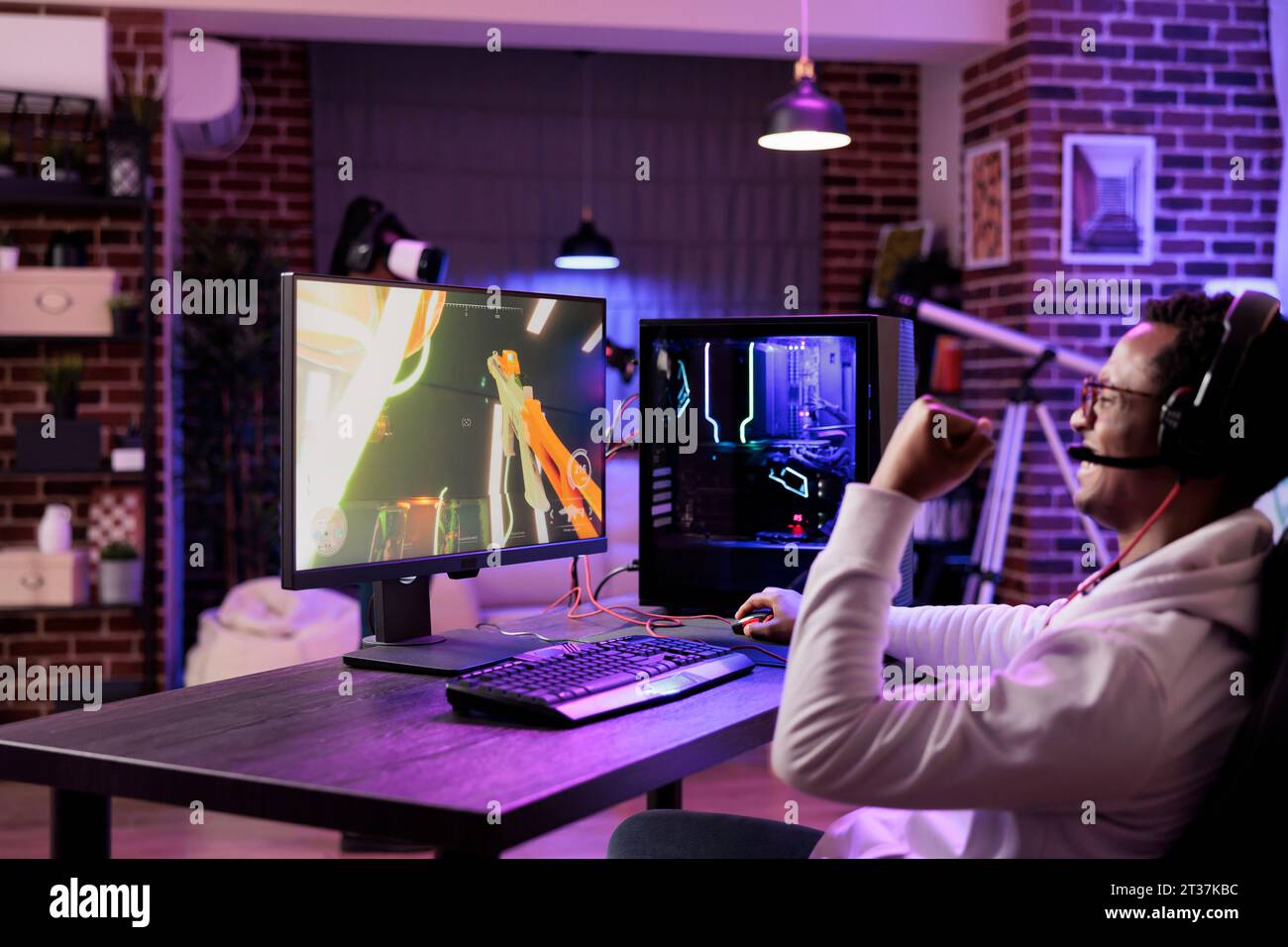 Professional gamer having live stream hi-res stock photography and ...