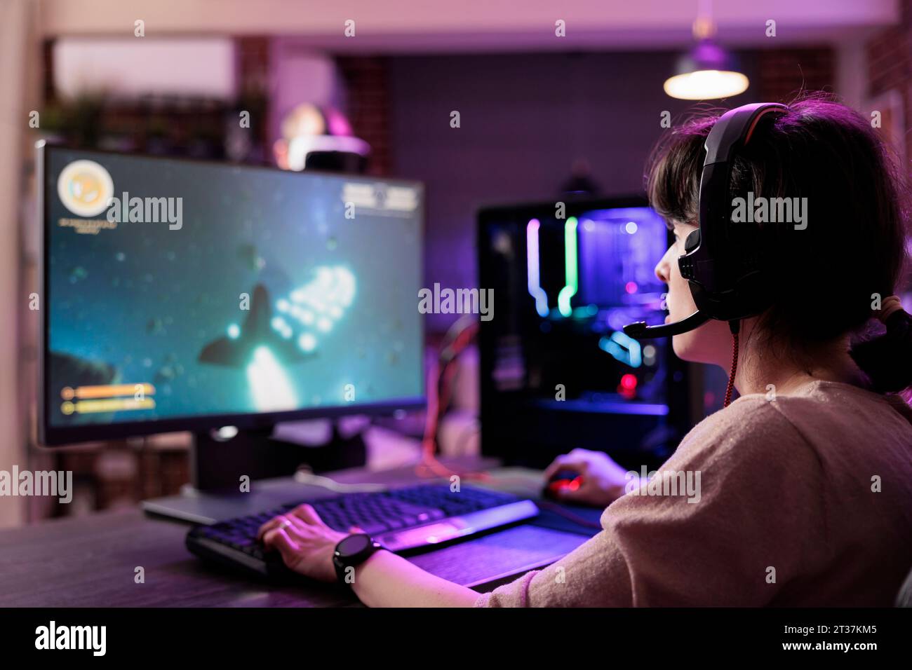 Professional gamer engaging in online competitive multiplayer tourney ...