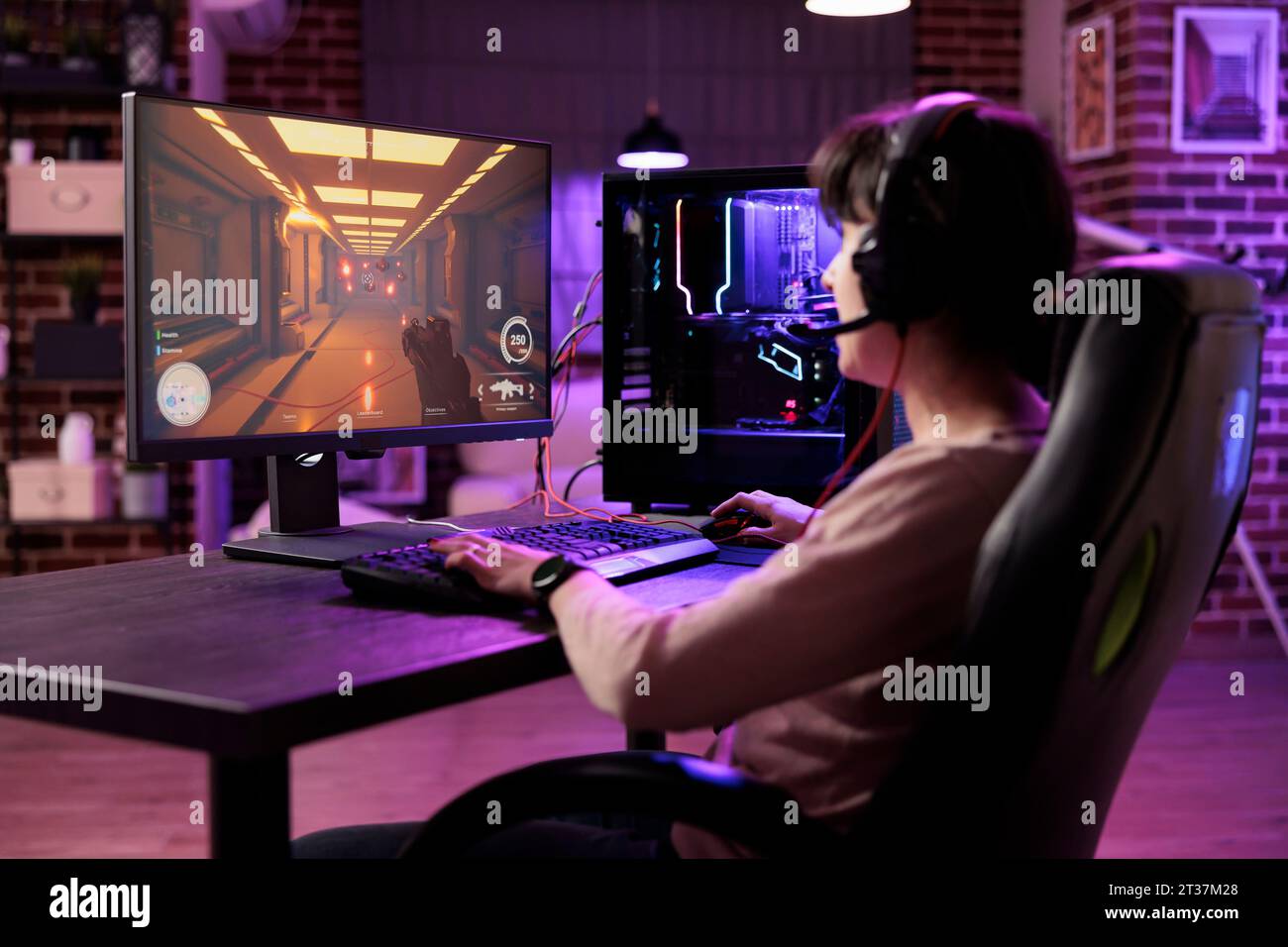 Pro streamer having fun with videogames on gaming pc, streaming live ...