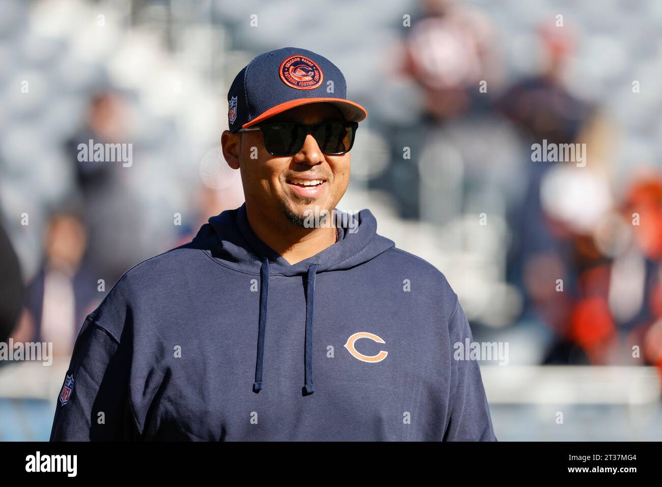 Chicago Bears general manager Ryan Poles walks on the field before an ...