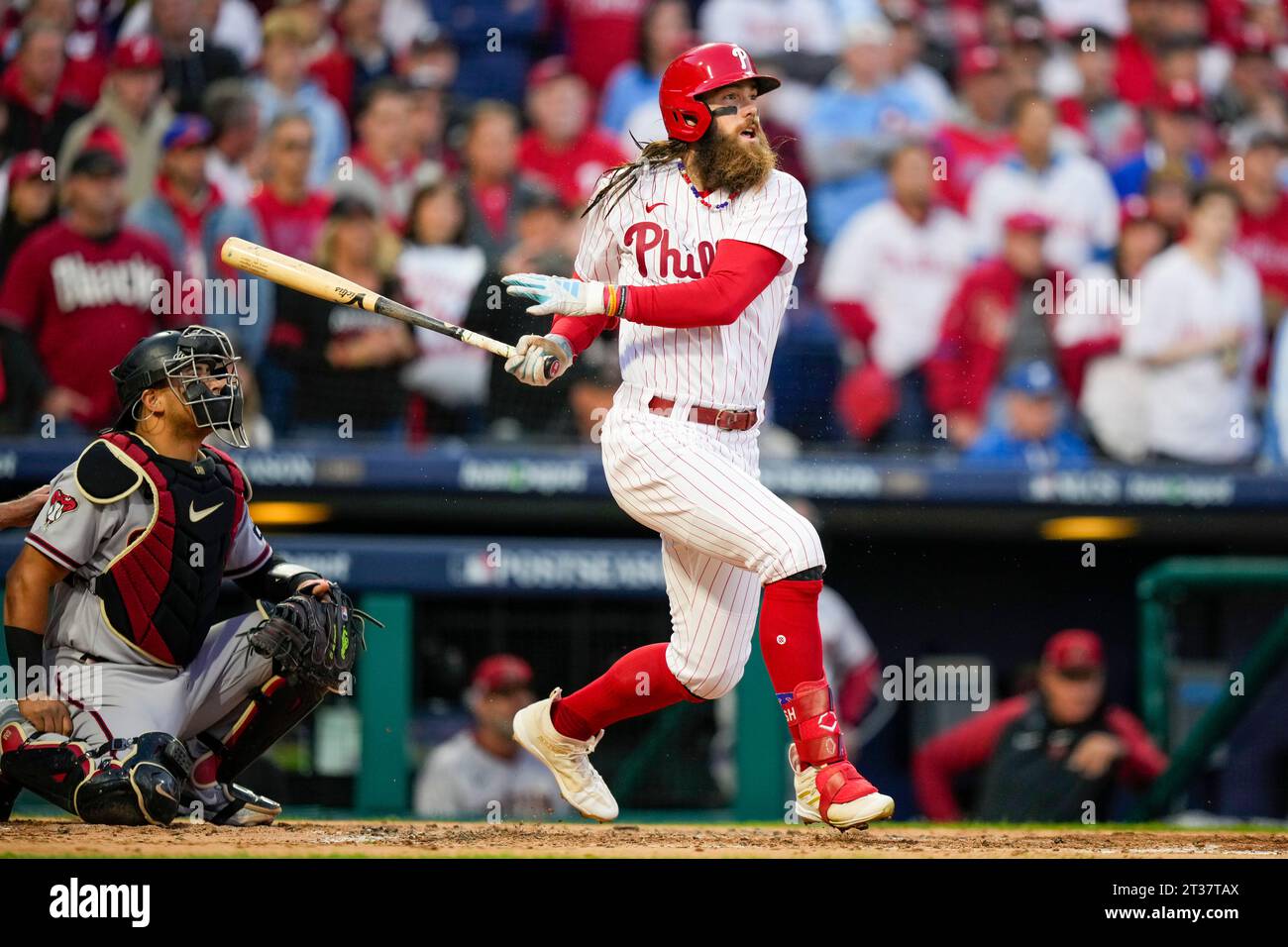 Philadelphia Phillies' Brandon Marsh watches his RBI-double against the ...