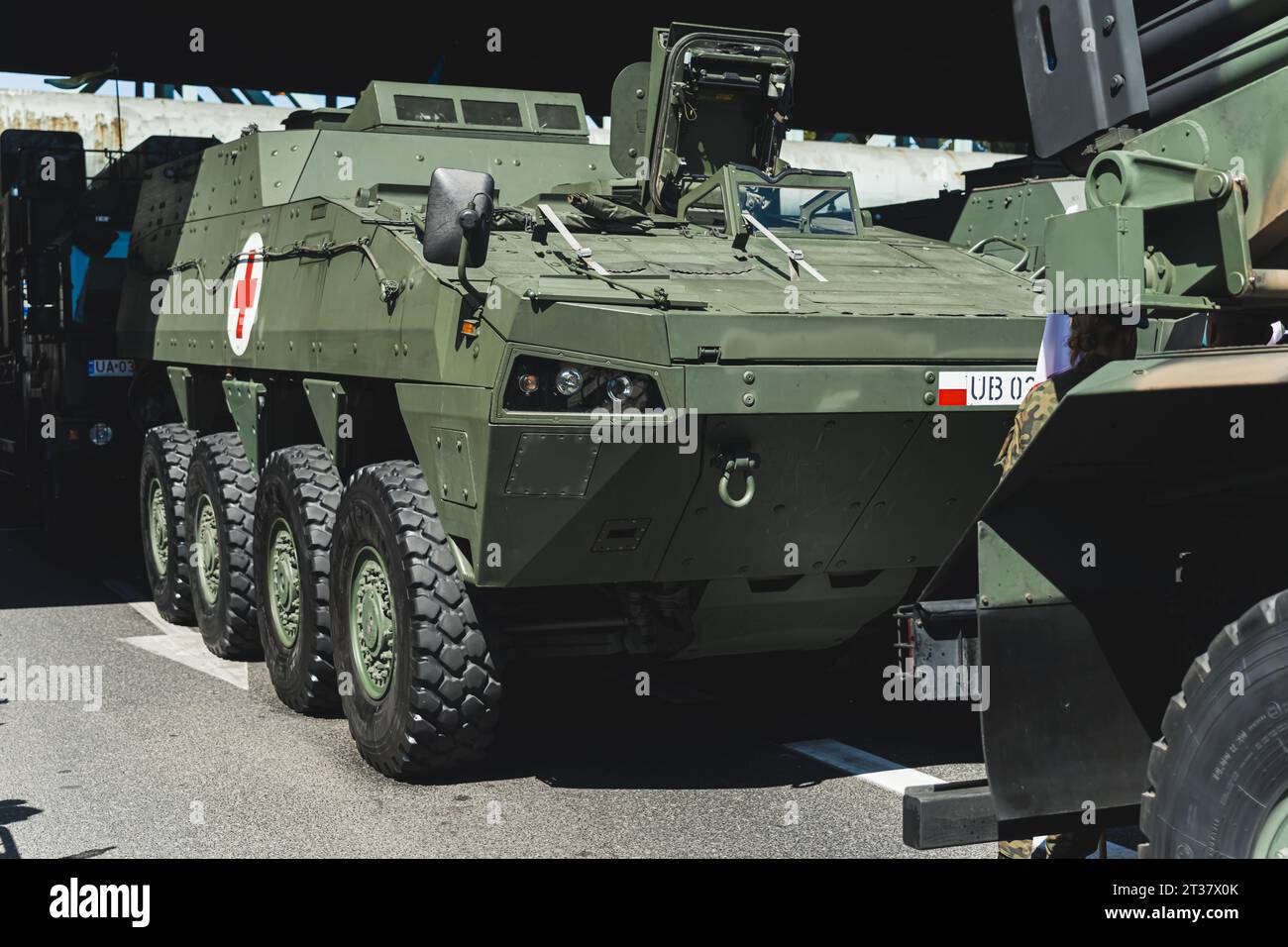16.08.2023 Warsaw, Poland. Medical armored personnel carrier. Medical cross on the armor of an ...