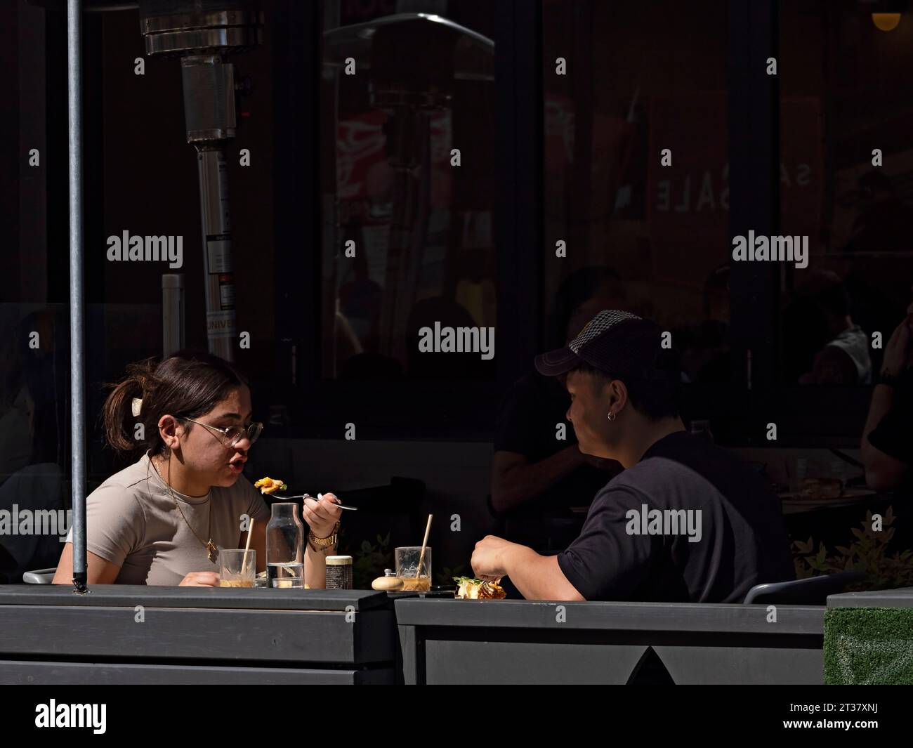 Melbourne Australia / Young couple dining in Puckle Street; Moonee ...