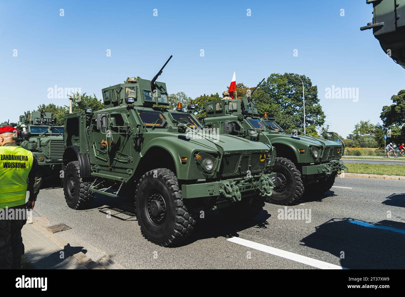 A column of vehicles at the demonstration. A convoy of heavy military ...