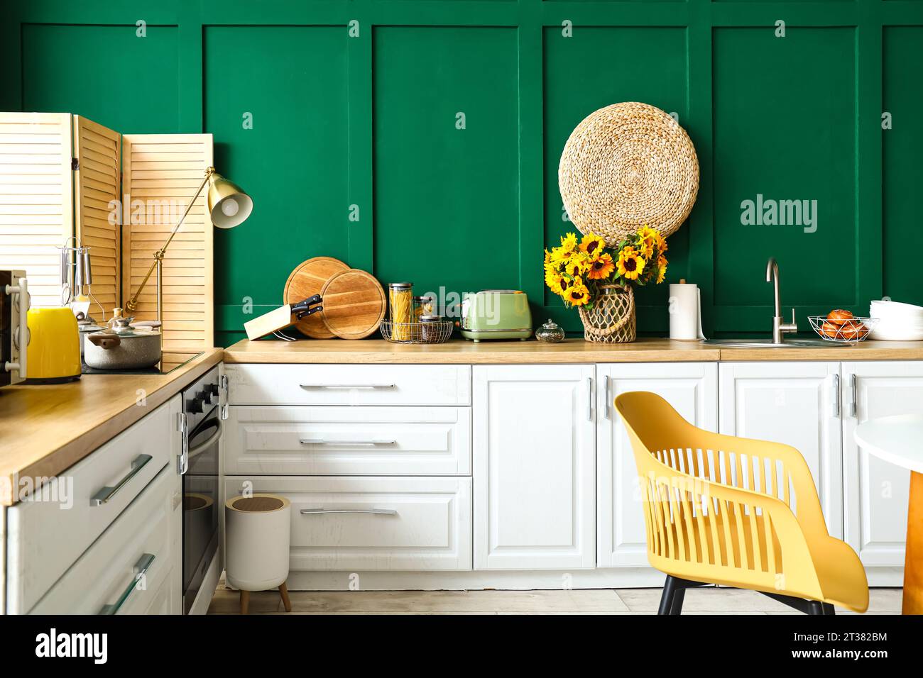 Interior of modern kitchen with utensils and white counters Stock Photo ...