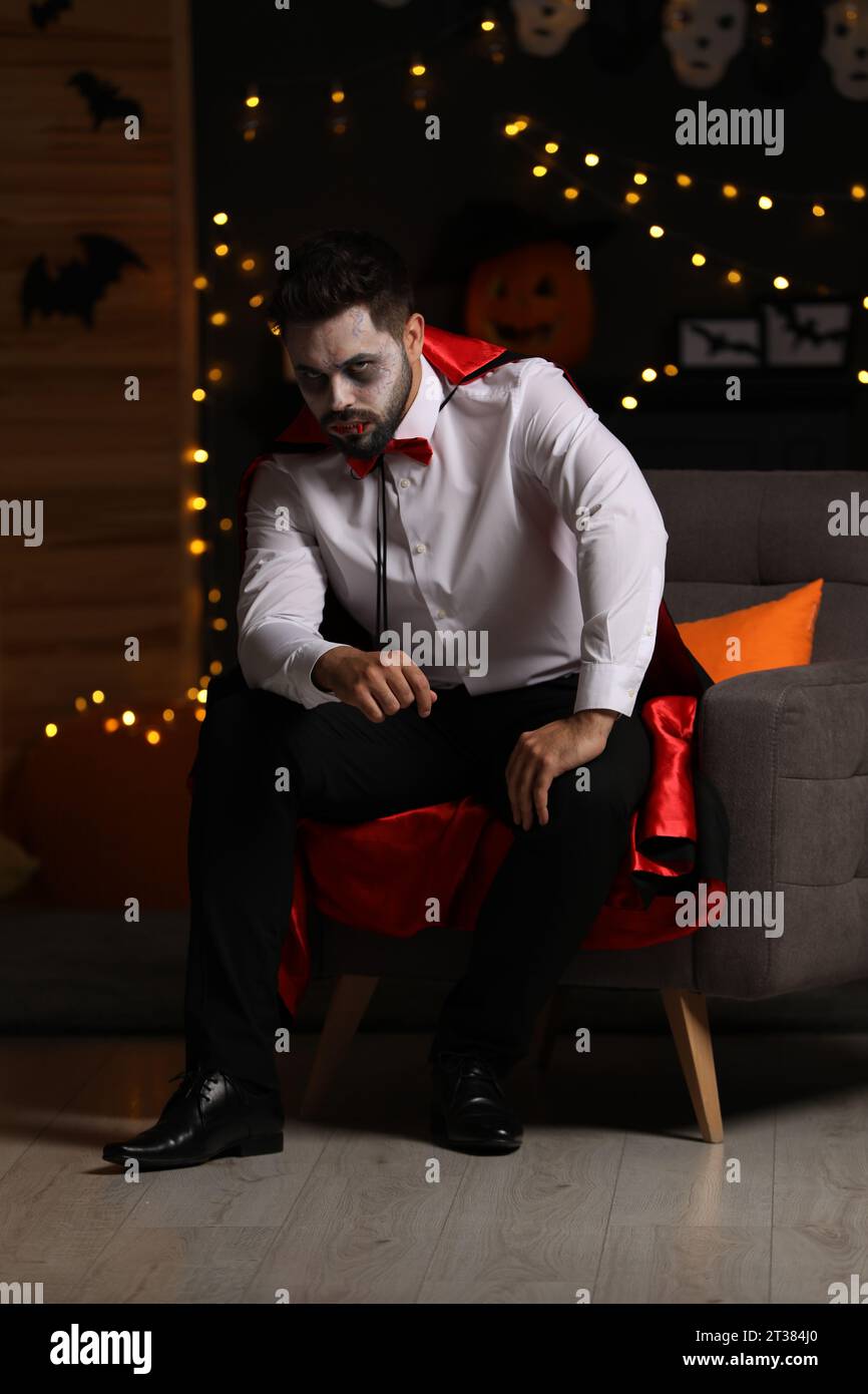 Vampire man fangs in black hi-res stock photography and images - Alamy