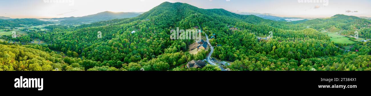 An aerial view of hills covered with green forests Stock Photo - Alamy
