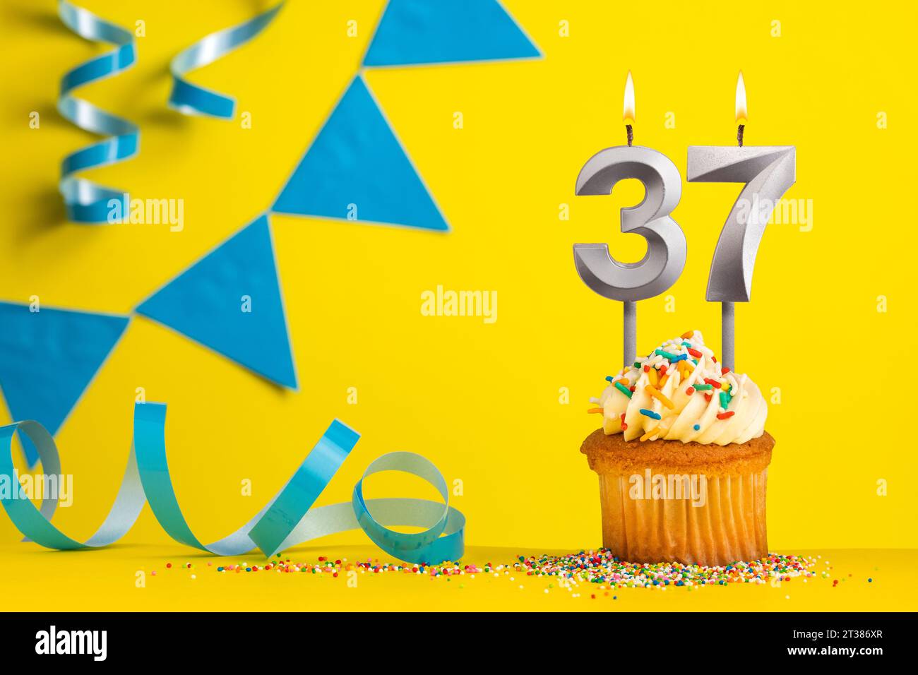 Birthday candle number 37 with cupcake - Yellow background with blue ...