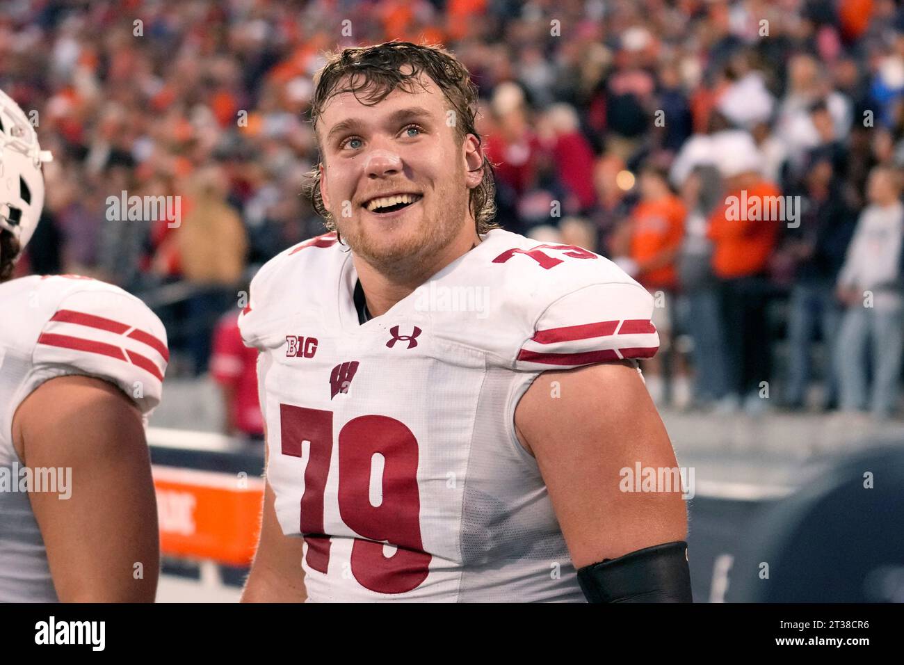 Wisconsin offensive lineman Jack Nelson smiles on the bench during the ...