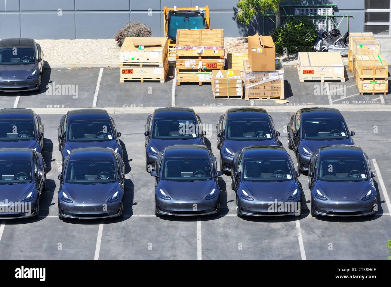 General overall aerial view of Tesla Model 3 vehicles awaiting delivery ...