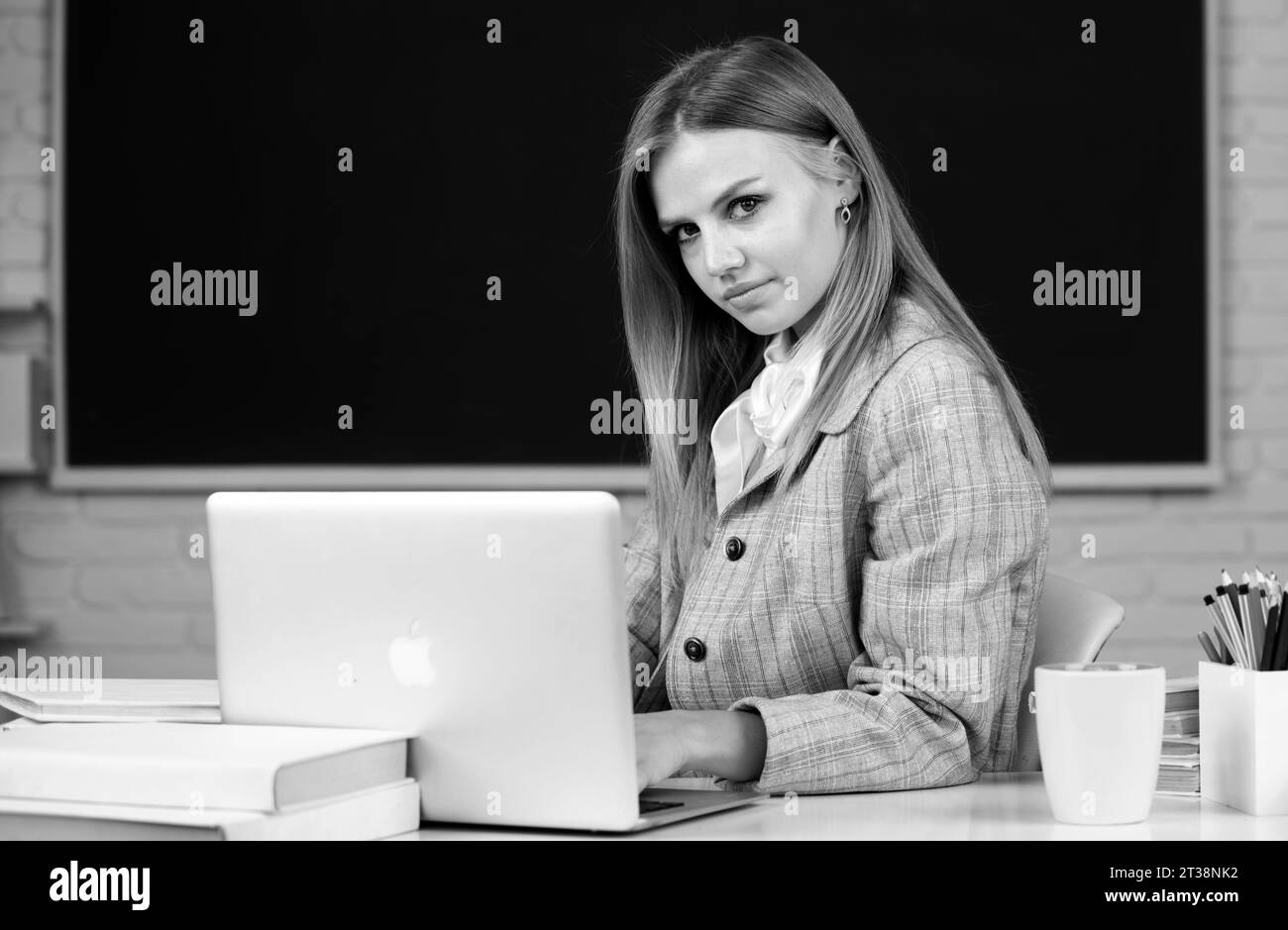 Cute teen girl, school student write notes, watch video online webinar ...