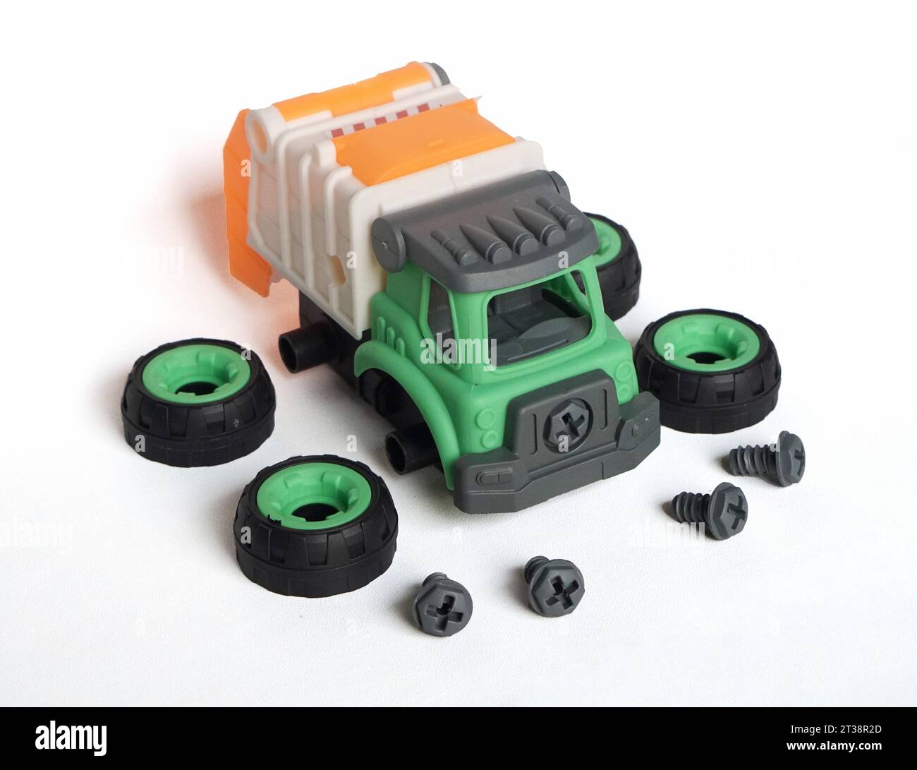 front view of plastic garbage truck toy with bolt and screwdriver ...