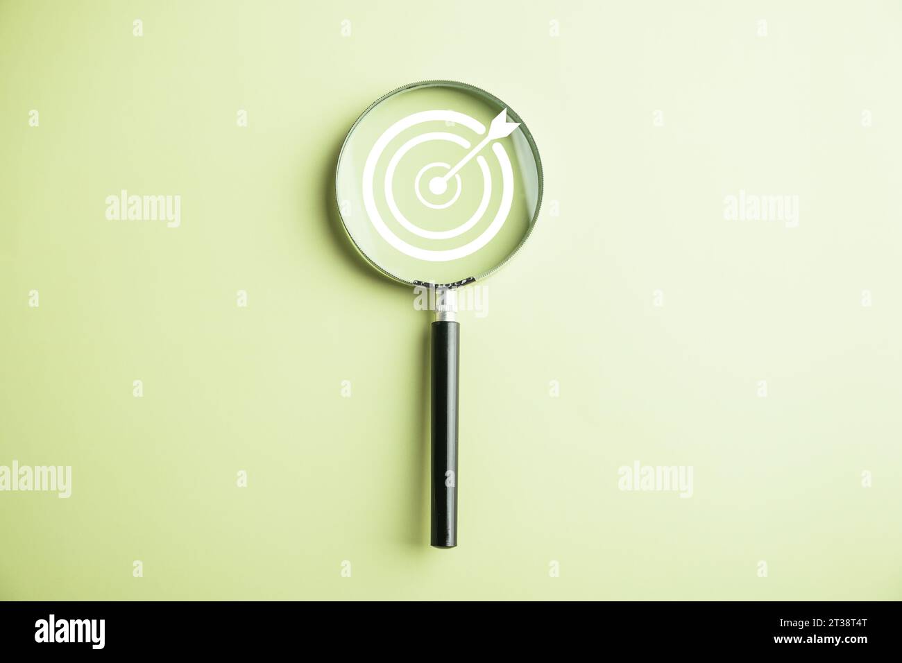 Target board inside magnifier glass for focus business objective Stock ...