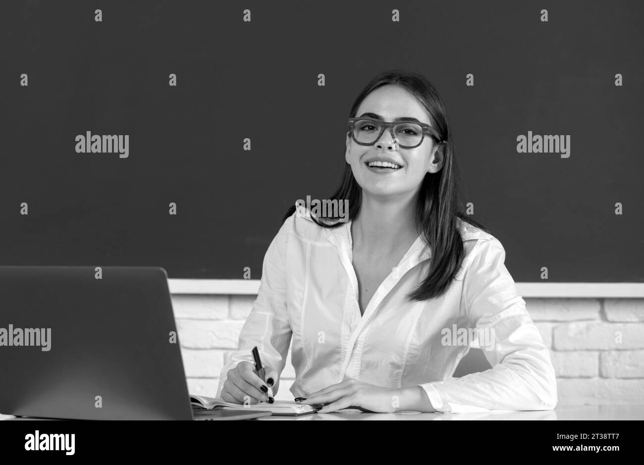 Female student on lesson lecture in classroom at high school or college ...